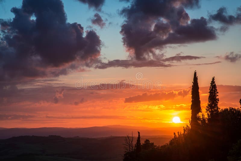 Sunset Val d Orcia Tuscany stock photo. Image of italian - 71150814