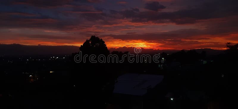 Sunset in Bandung, Indonesia Stock Photo - Image of building ...