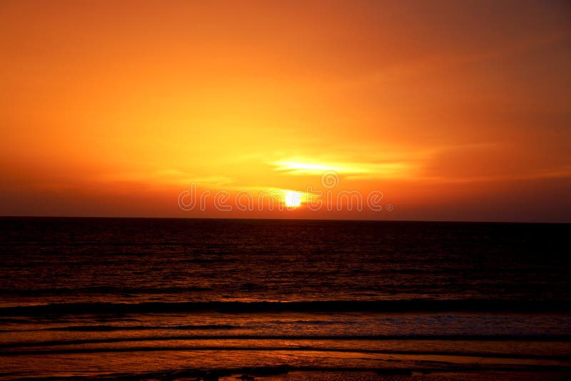 Image of Sunset View at Beach with Reflection on Water Stock Photo ...