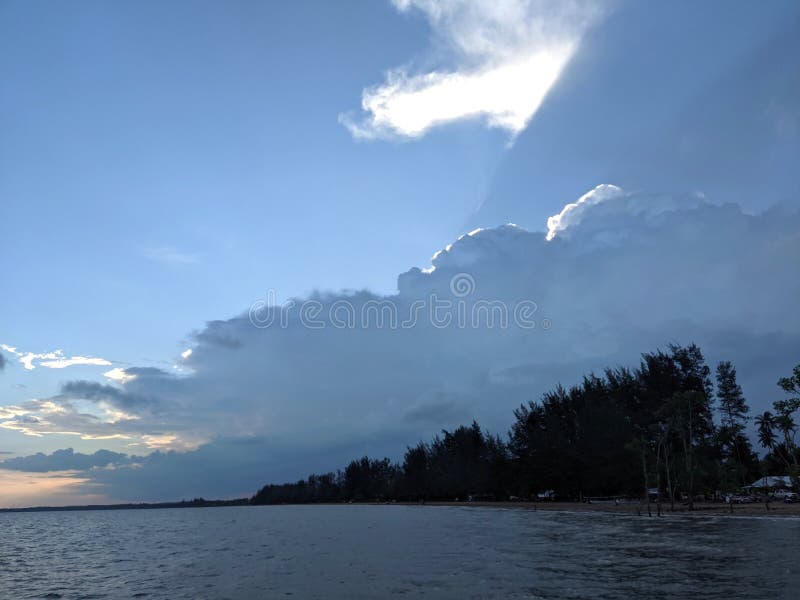 The Sunset View is Blocked by Clouds, from the Beach Stock Image ...