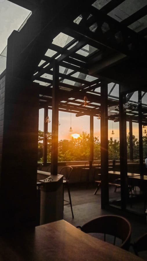 Sunset view from the cafe stock photo. Image of sunset - 263869810