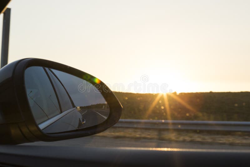 Sunset View from the Car in the Rear Mirror. Summer Stock Photo - Image ...