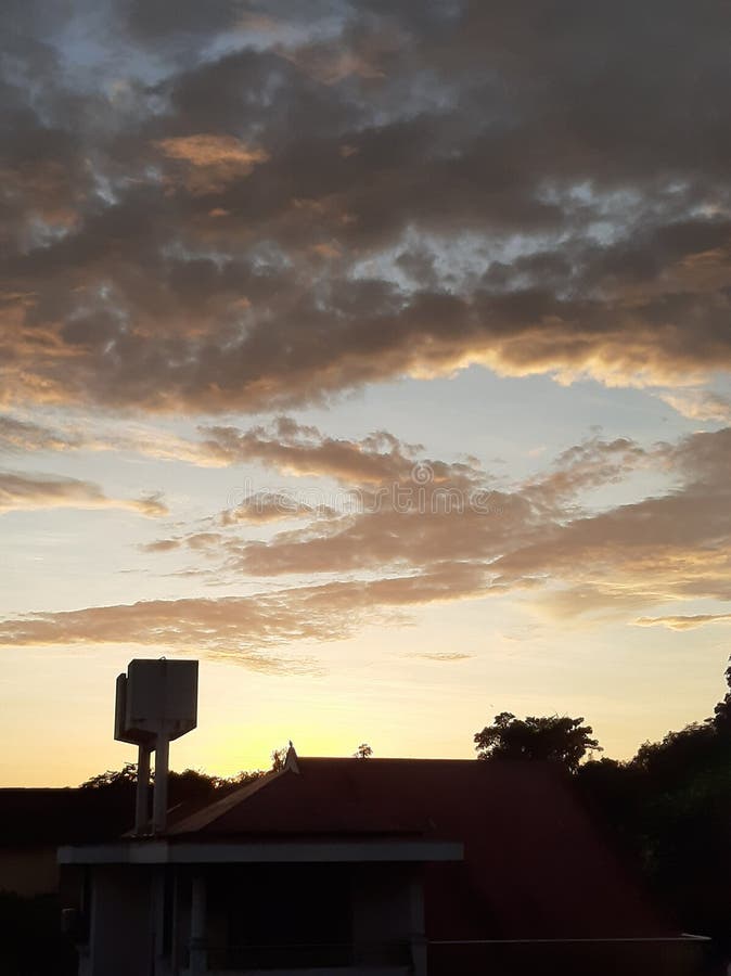 Sunset view in the Evening stock photo. Image of clouds - 192553568