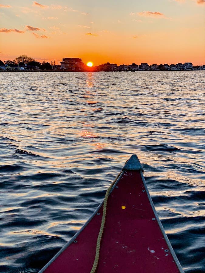 Beautiful Sunset Over Bay View from Canoe Boat Stock Photo - Image of ...