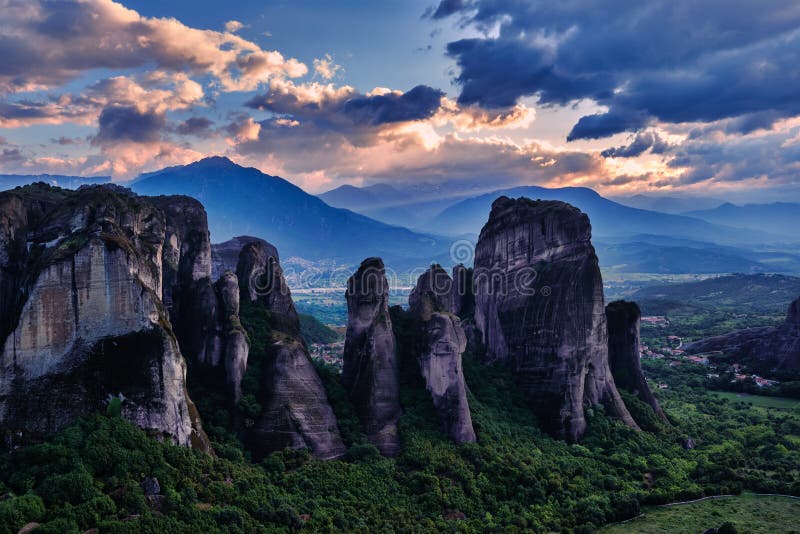 Sunset View of Meteora Valley Rocks in Foreground and Mountains in ...