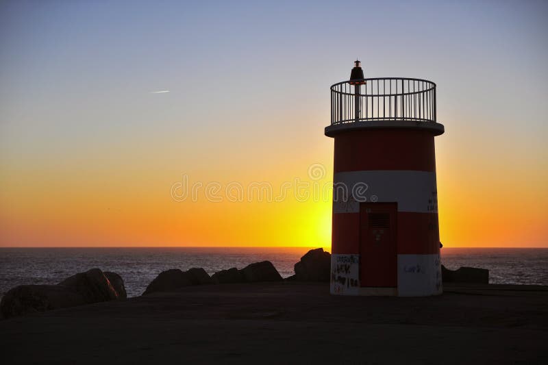 Sunset View of an Old Lighthouse in Nazare Stock Photo - Image of ...