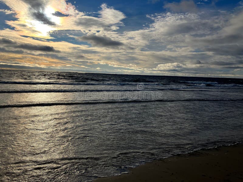 Sunset view over the ocean stock photo. Image of ocean - 267313574