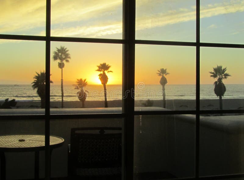 Sunset View from Restaurant Window Stock Photo - Image of coast, grove ...