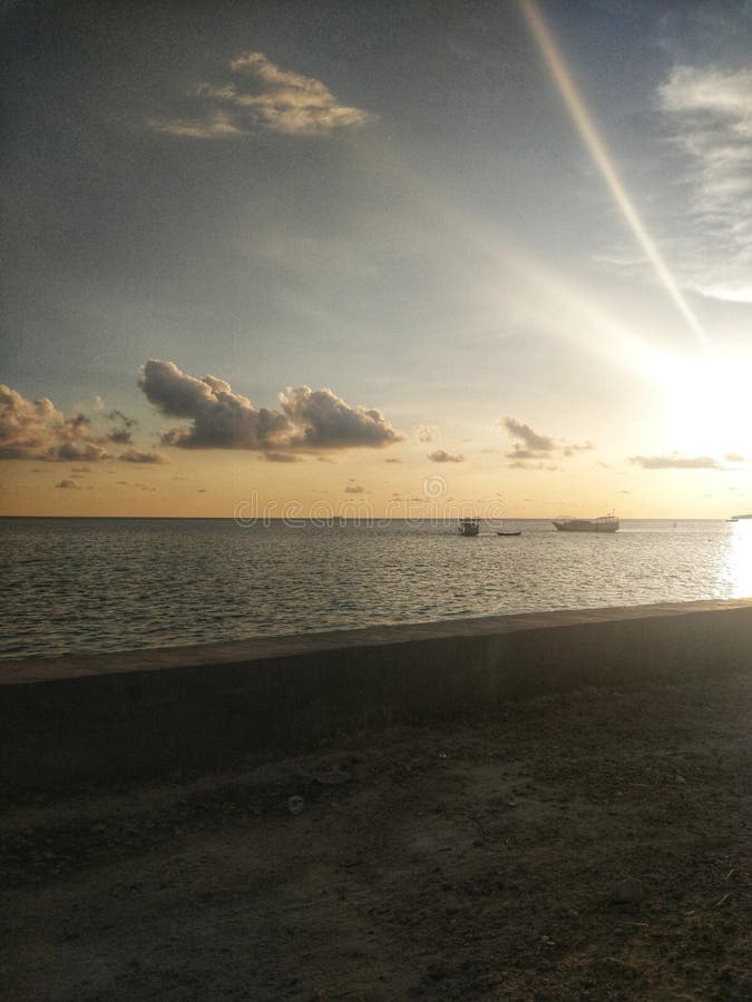 See a Park Boat in the Middle of the Beach Stock Image - Image of ...
