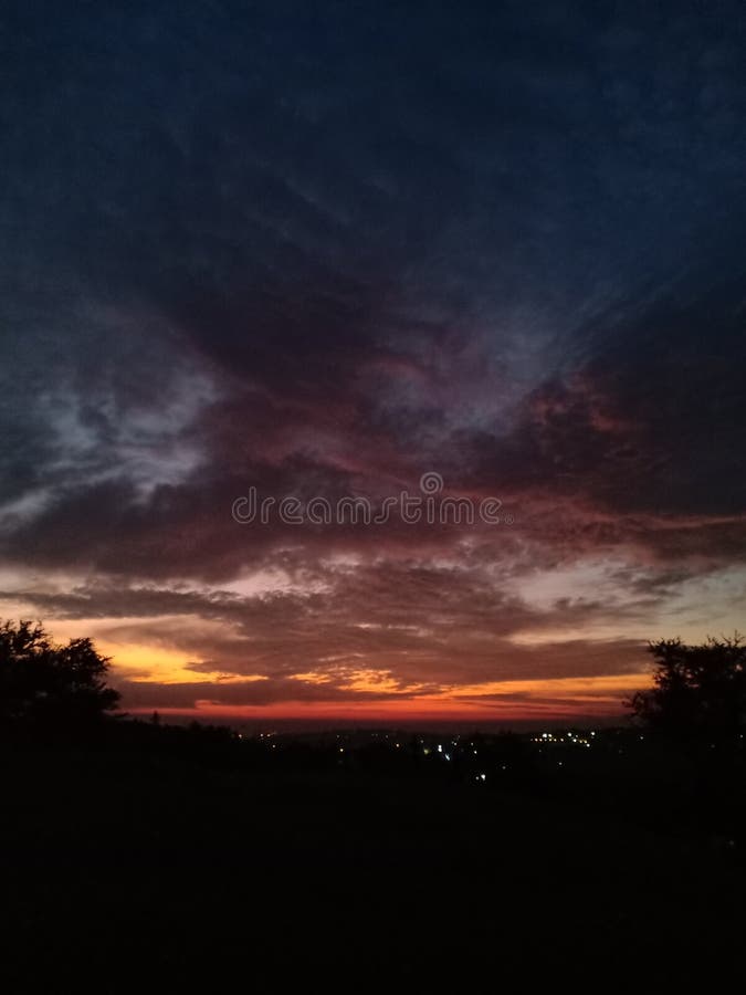 Sunset View with the Sparkle of City Light Stock Image - Image of dusk ...