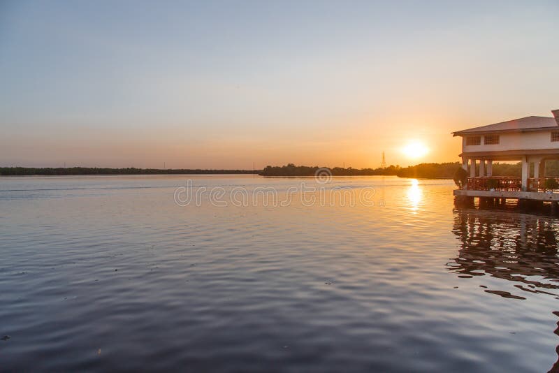 Sunset with villa on sea stock photo. Image of luxury - 75203598