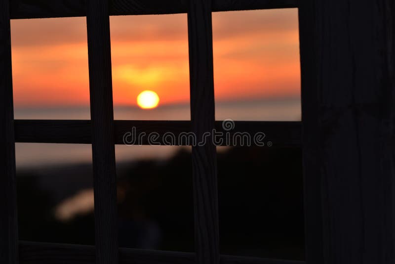 Sunset is Visible through the Grille of the Window Stock Photo - Image ...