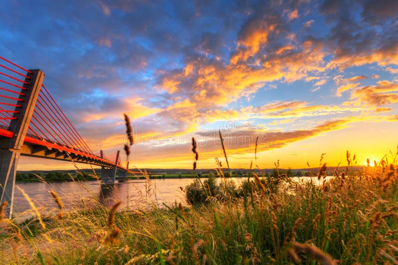 Sunset at Vistula River and Cable Stayed Bridge of Kwidzyn, Poland ...