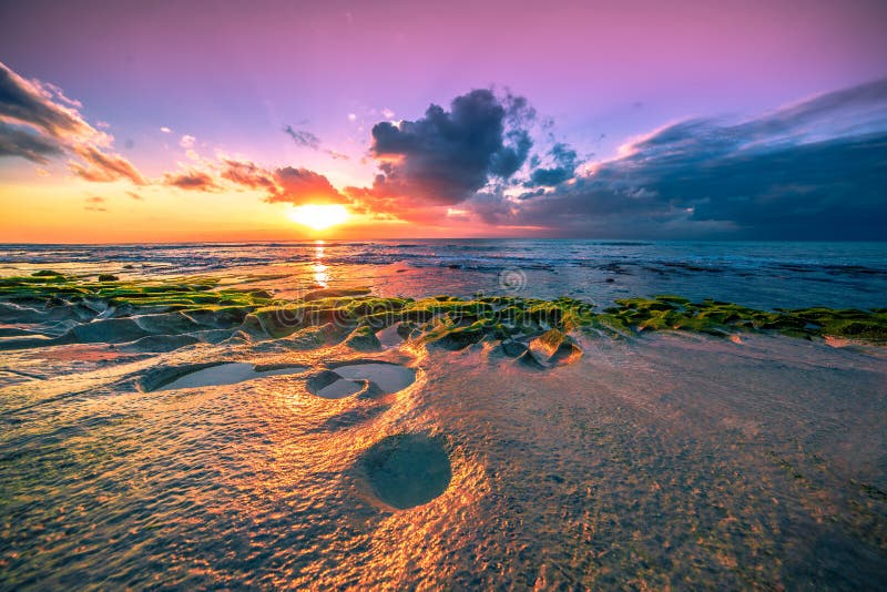 Sunset on the Volcanic Beach Balangan Stock Photo - Image of white ...
