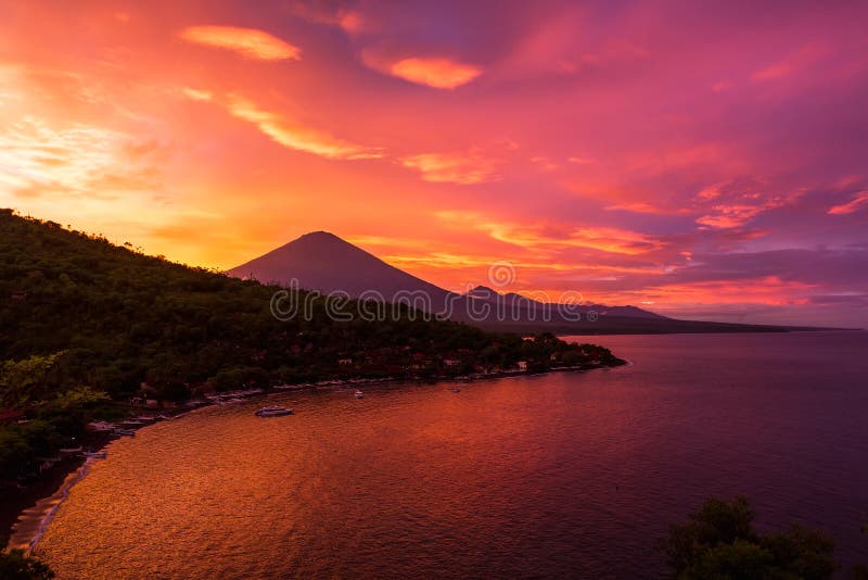 Sunset and volcano stock image. Image of pink, ocean - 50752109