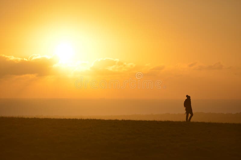 Sunset walk stock image. Image of footpath, walker, countryside - 84312339