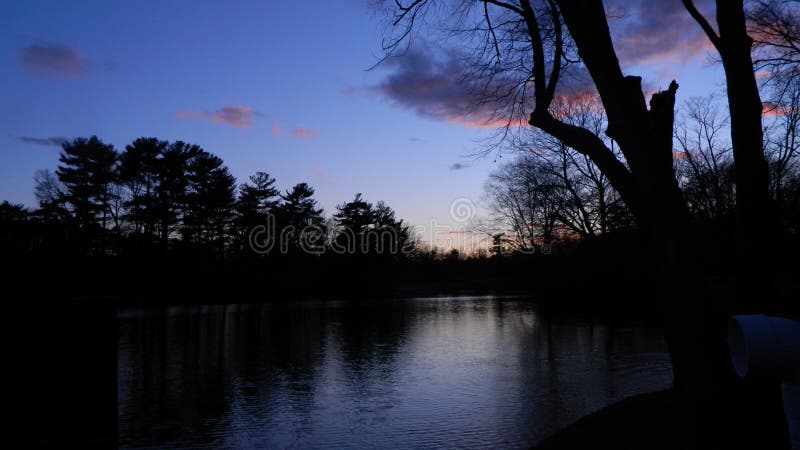 Sunset on a Warm Summer Night Stock Image - Image of warm, water: 145202953