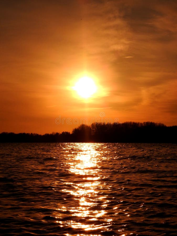 Sunset over the water stock image. Image of boating - 217134511