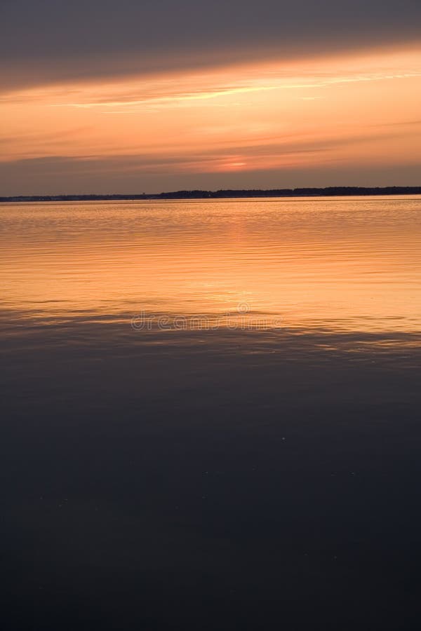 Sunset on the Water stock image. Image of shoreline, coastline - 19868603