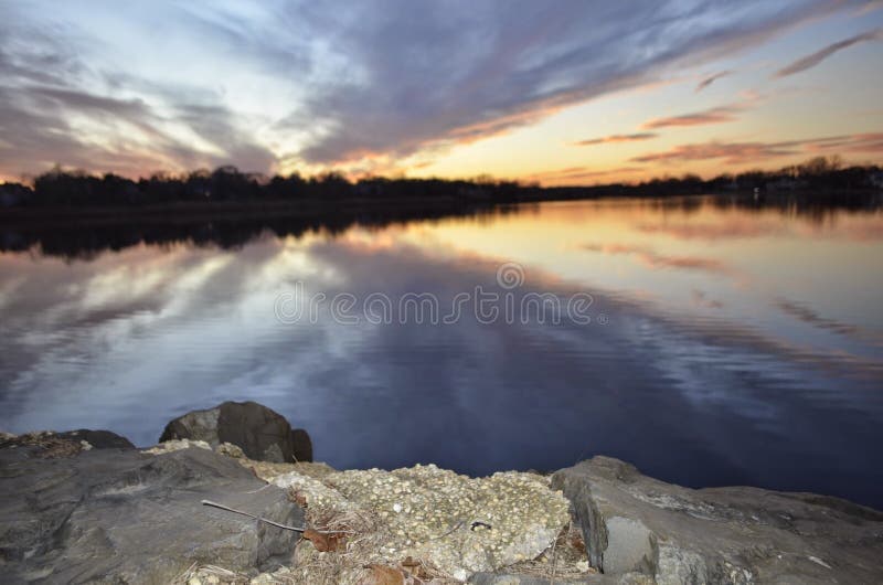 Sunset in the water stock image. Image of sunset, sunrise - 50760183