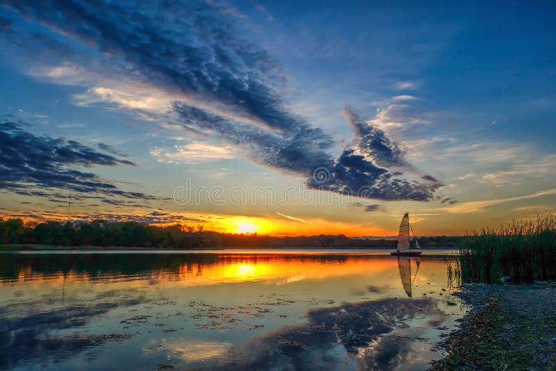 Sunset on the water stock photo. Image of clouds, breathtaking - 79126756