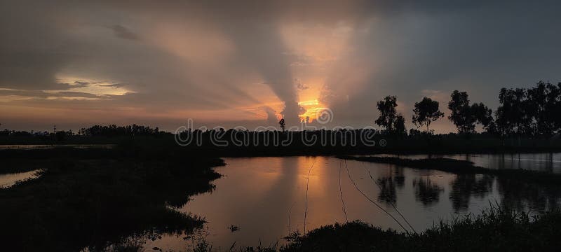 Sunset water stock image. Image of night, darkness, light - 262945333