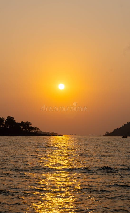 Sunset on the Water, on an Island (portrait Mode Stock Photo - Image of ...
