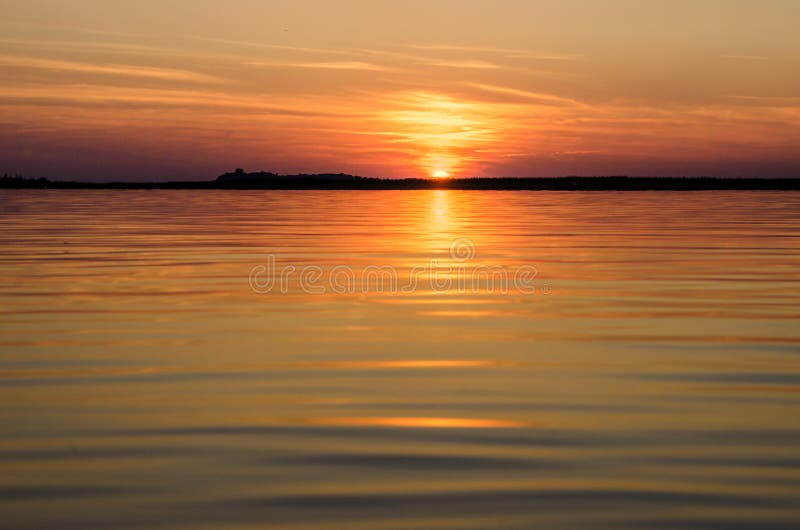 Sunset in the water. stock image. Image of dawn, light - 99506065