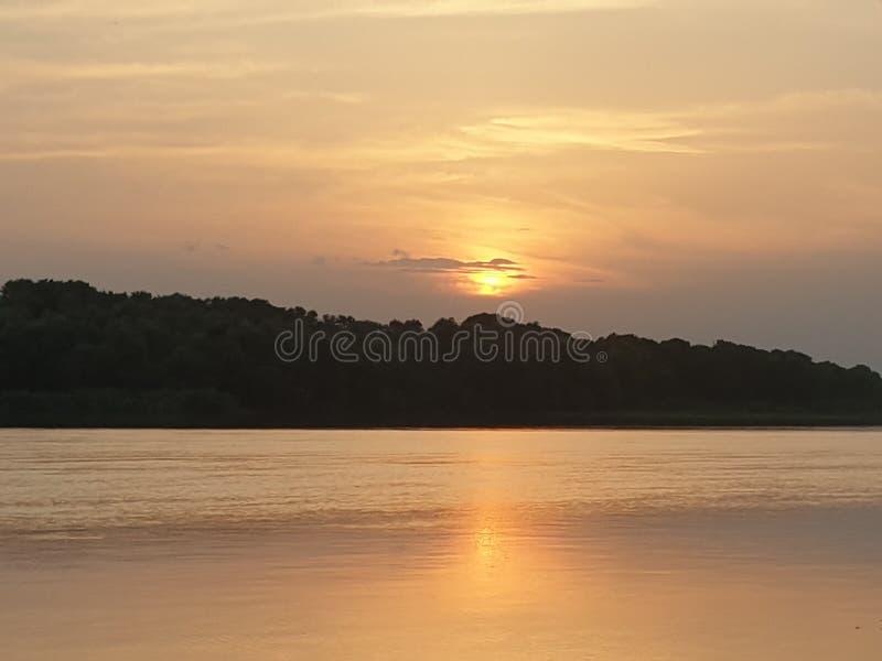 Sunset into Water Reflection Low Quality Stock Image - Image of quality ...