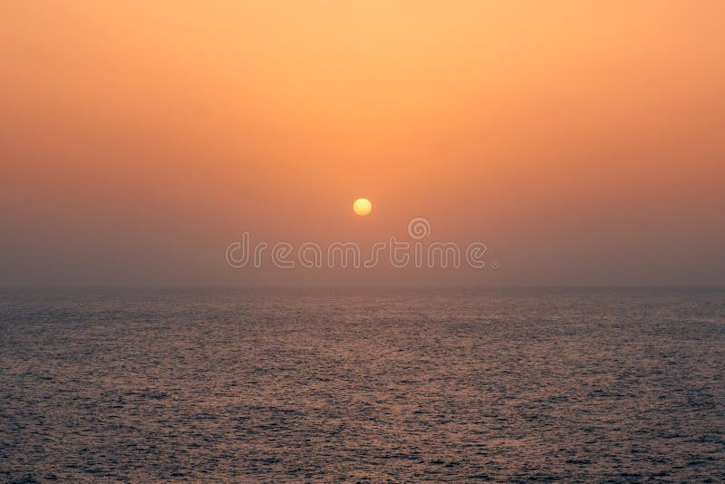 Sunset on Water, Sun Going Down Behind Ocean Stock Image - Image of ...