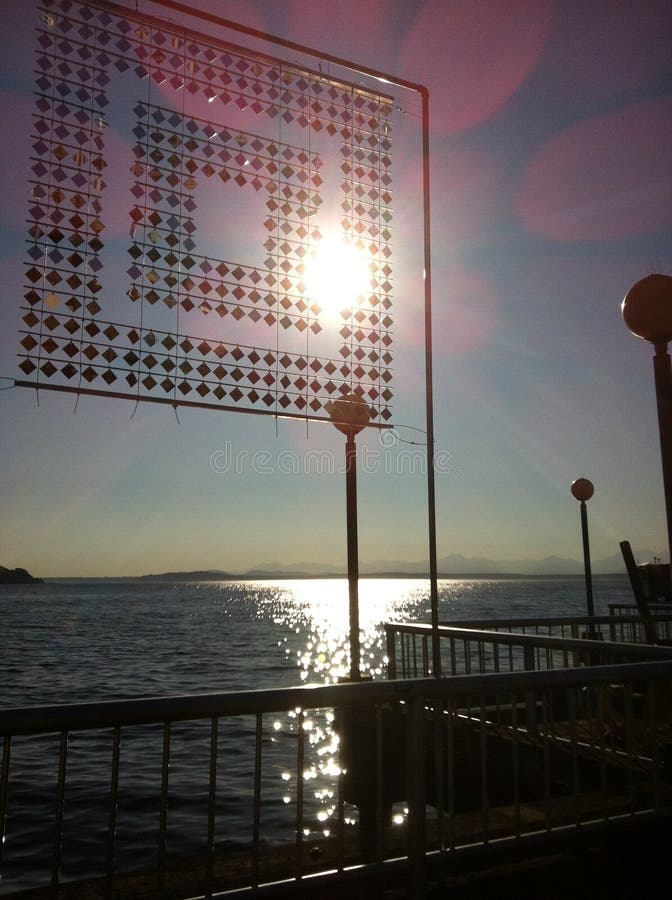 Sunset on the waterfront stock photo. Image of light - 36107094