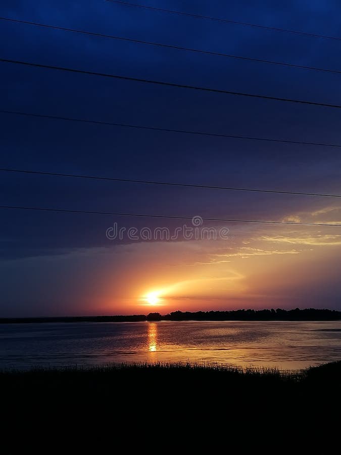 Sunset wather refelction stock photo. Image of wather - 161146948