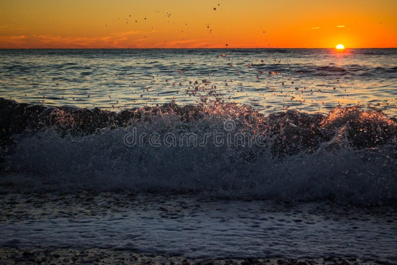 Sunset with Wave stock image. Image of ocean, florida - 73756233