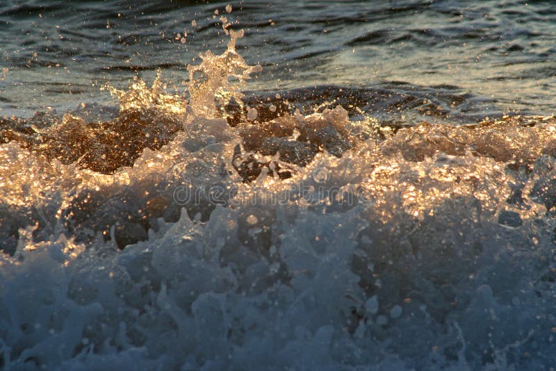 Sunset and wave splash stock photo. Image of pattern - 121804436