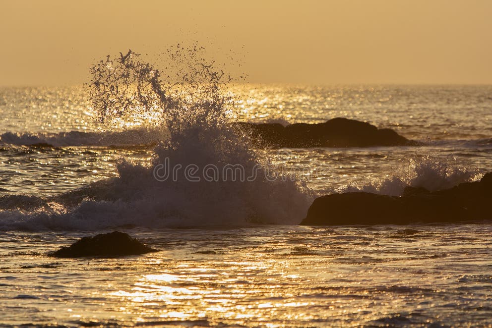 Sunset Wave Splash, Newfoundland Stock Photo - Image of ocean, surf ...