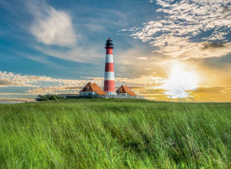 Sunset at the Westerhever Lighthouse Stock Image - Image of green ...