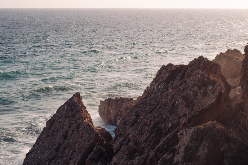 Sunset. Wild Rock Beach. the Natural Rock Formation. Stock Photo ...