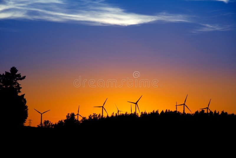 Sunset with windmills stock image. Image of horizon, sundown - 29202959