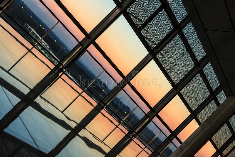 Sunset through a Window at an Airport Stock Image - Image of exposition ...