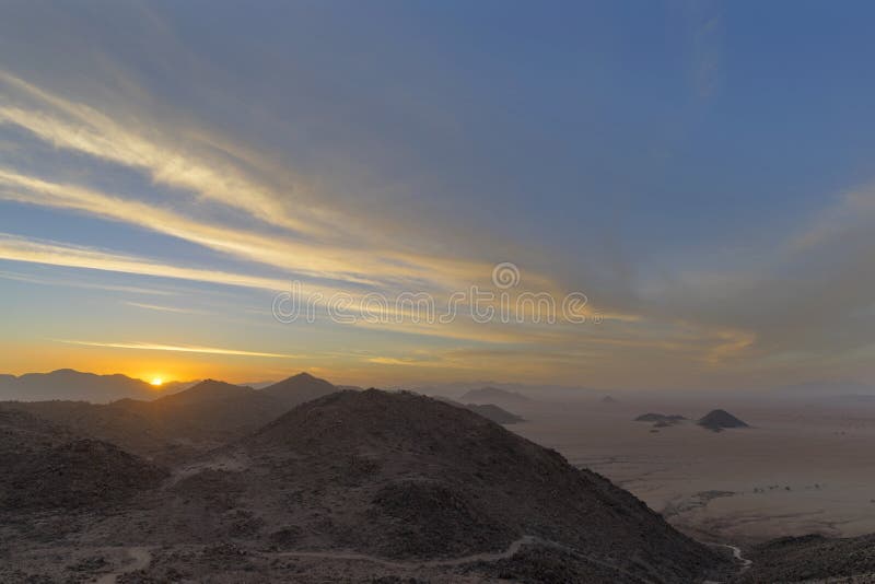 Sunset with Windswept Clouds in the Namib Desert Stock Photo - Image of ...