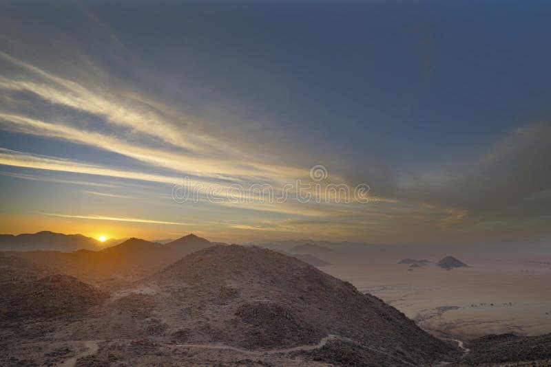 Sunset on windy dusty day stock photo. Image of environment - 133388126