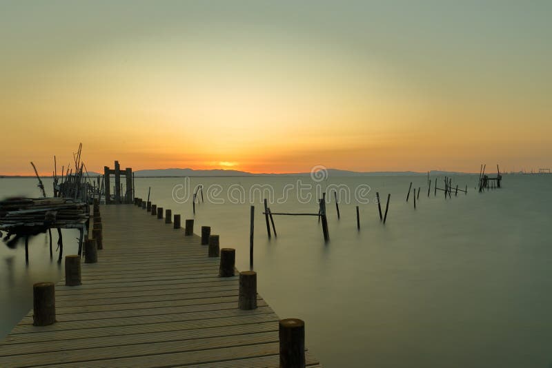 Sunset on the Wood Platform Stock Image - Image of water, cloud: 154527359