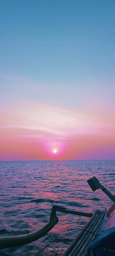 Sunset yang indah stock photo. Image of sunset, afterglow - 255777796