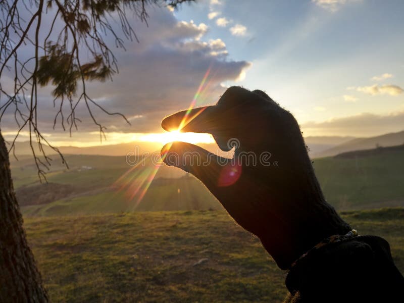 Sunset in your hand stock image. Image of nature, hand - 89019415