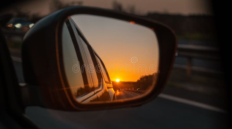 Sunsets Reflection on the Side Mirror of the Car Stock Photo - Image of ...