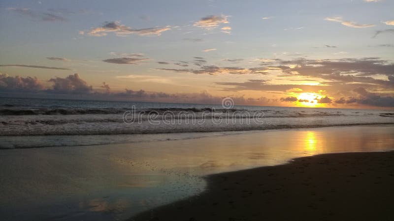 Sunsets on a Very Pretty Beach Stock Image - Image of sunrise, morning ...