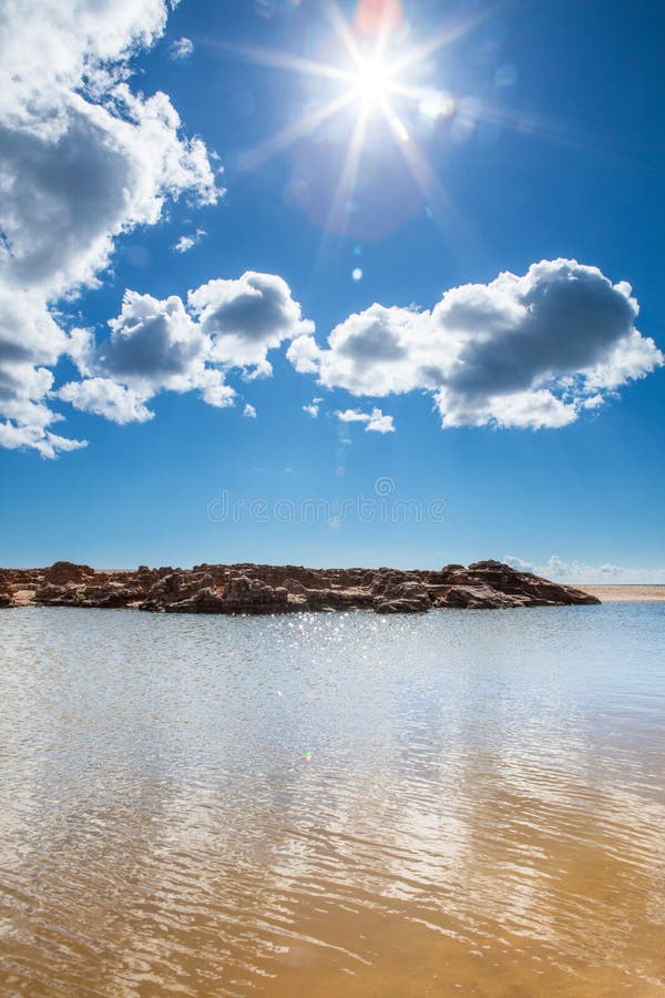 Sunshine on the beach stock image. Image of weather, land - 31049149