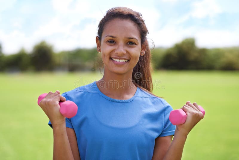 Sunshine and Exercise. a Group of Young Women Exercising Outdoors ...