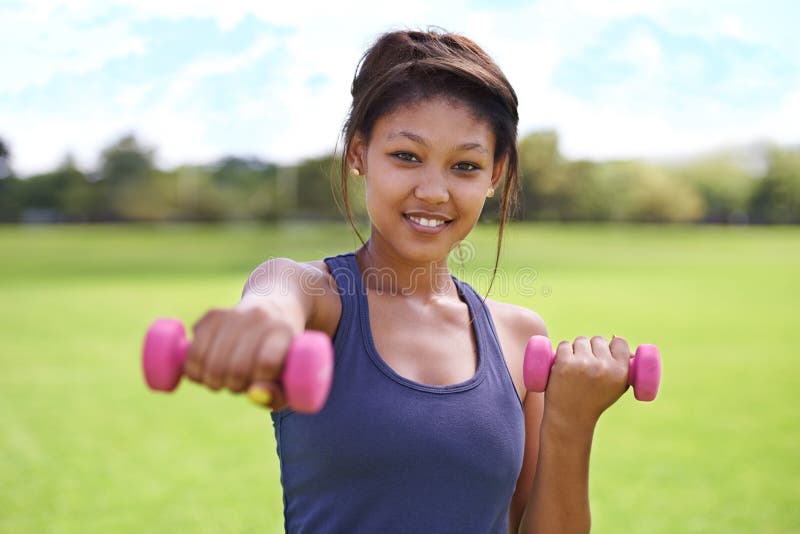 Sunshine and Exercise. a Group of Young Women Exercising Outdoors ...