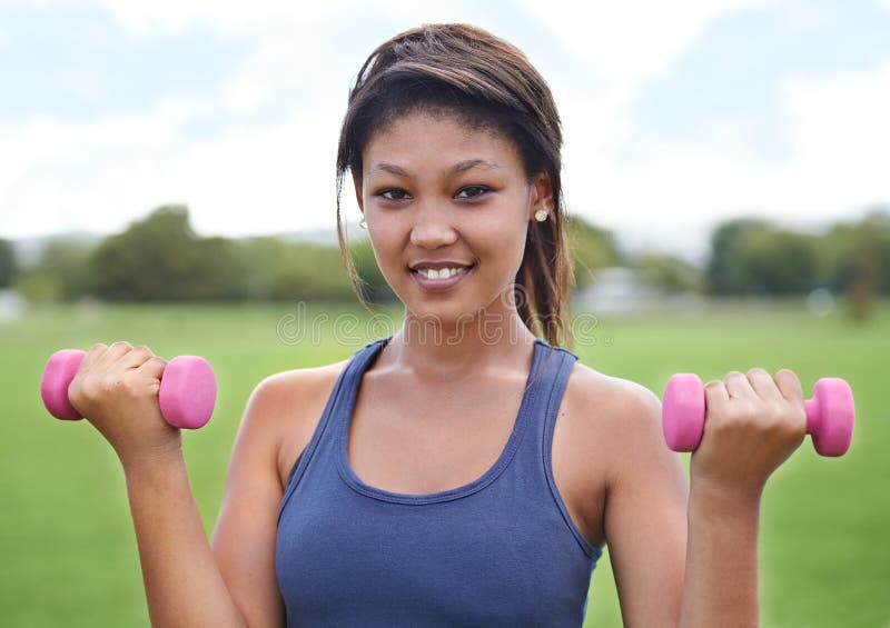 Sunshine and Exercise. a Group of Young Women Exercising Outdoors ...